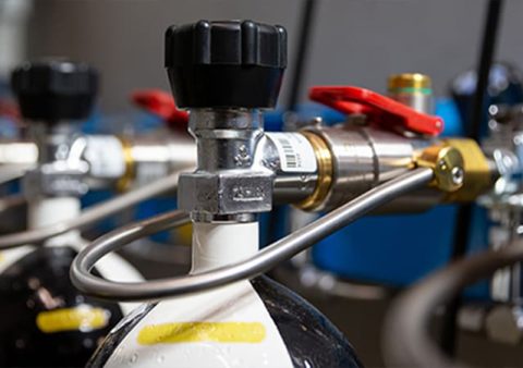 Screw-in valves for controlled flow